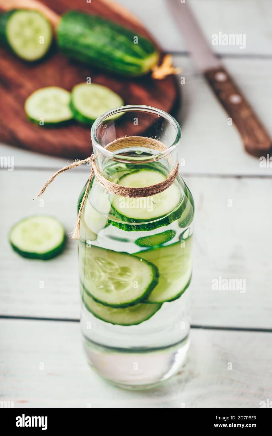 Infusion with sliced cucumber in bottle Stock Photo - Alamy