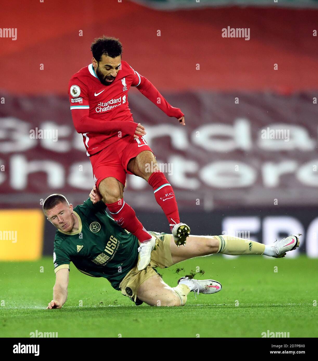 Sheffield United's John Lundstram tackles Liverpool's Mohamed Salah ...