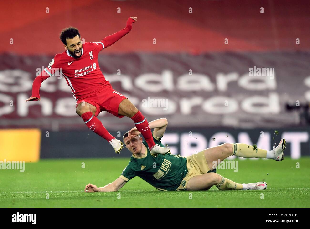 Sheffield United's John Lundstram tackles Liverpool's Mohamed Salah ...