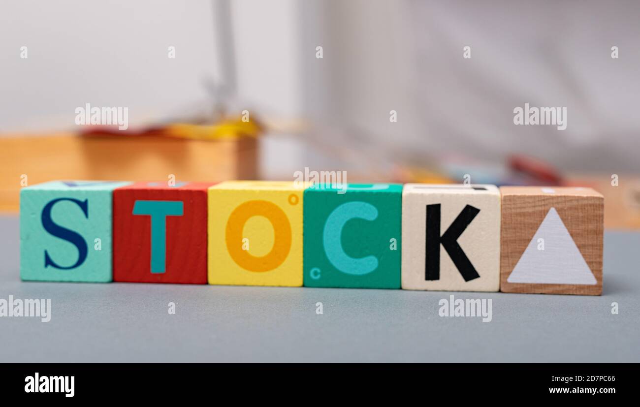 Wooden cubes with 'stock' written on them Stock Photo - Alamy