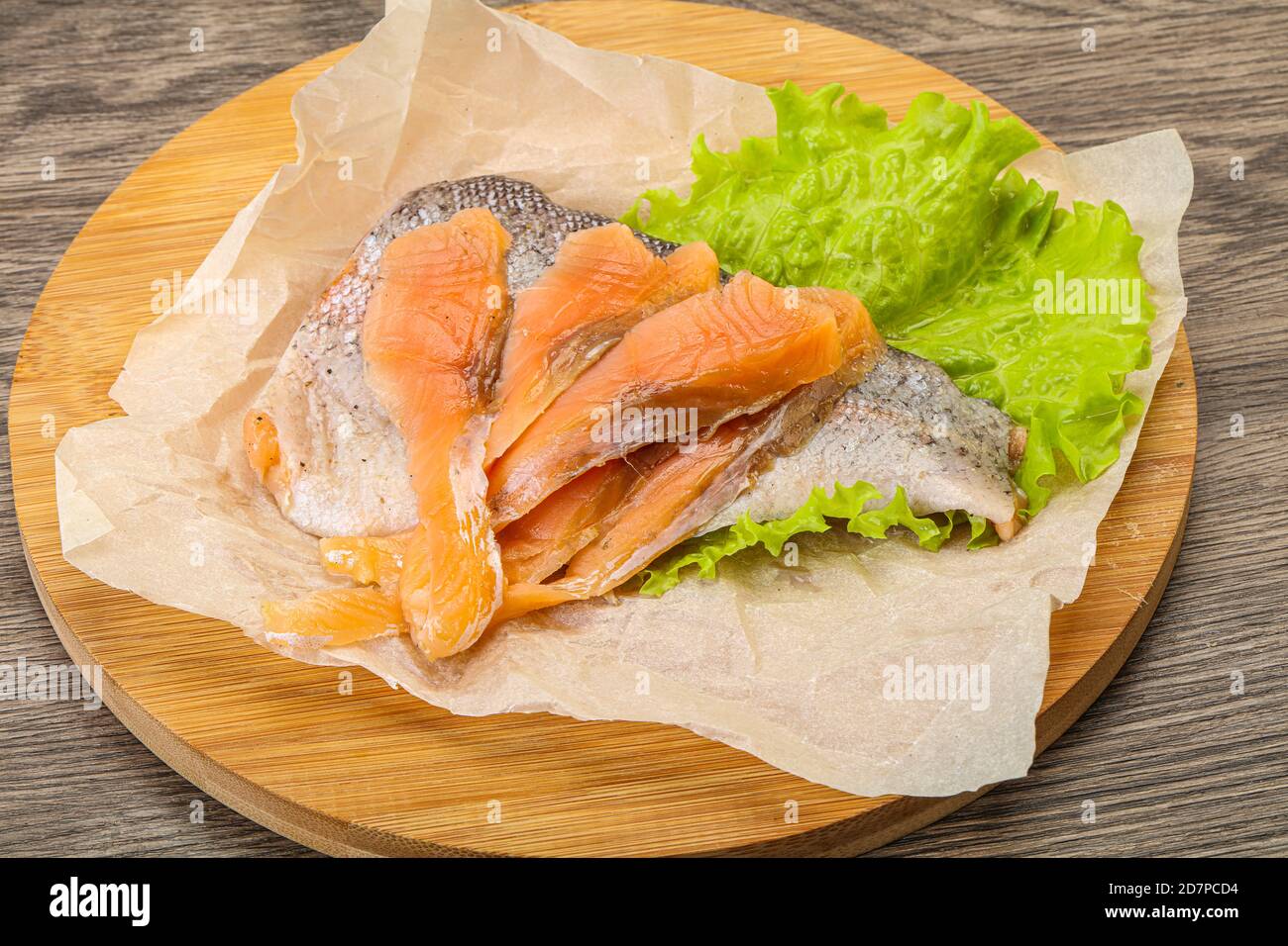 Sliced natural wild trout fillet over board Stock Photo - Alamy