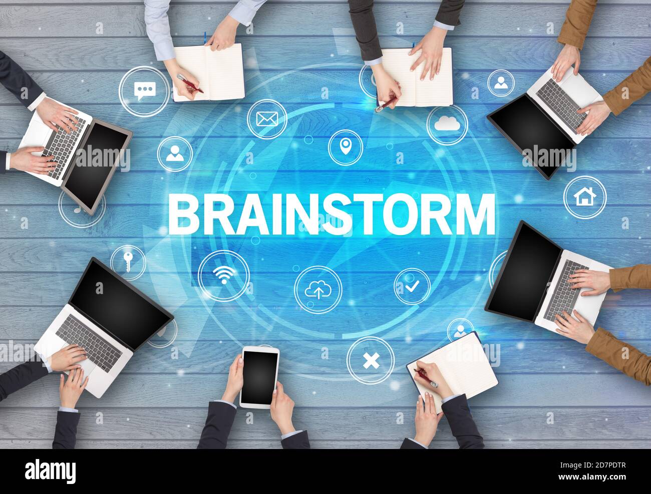 Group of people having a meeting with BRAINSTORM insciption, social ...