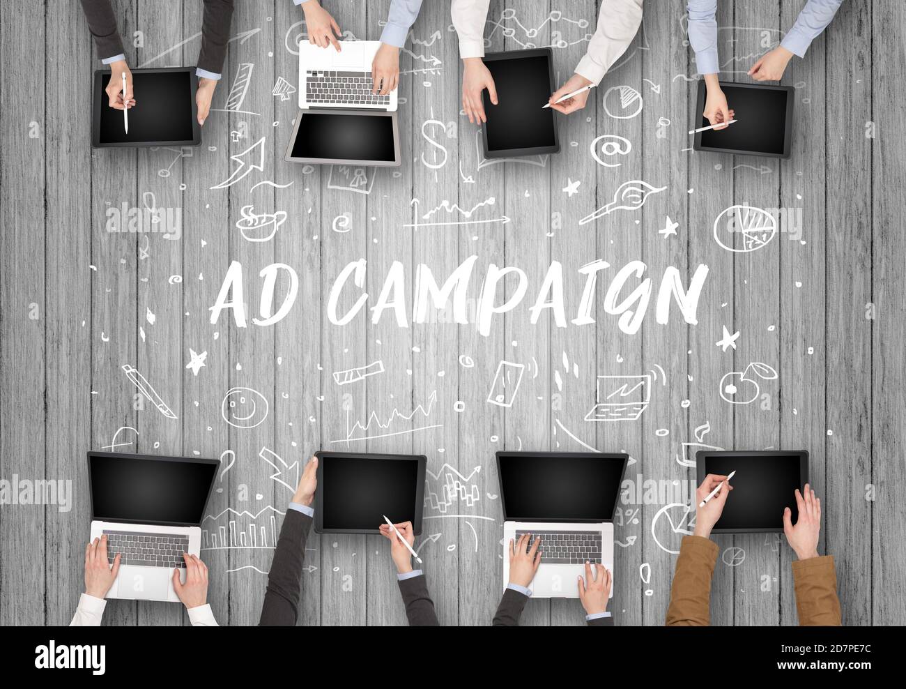 Group of business people working in office with AD CAMPAIGN inscription ...