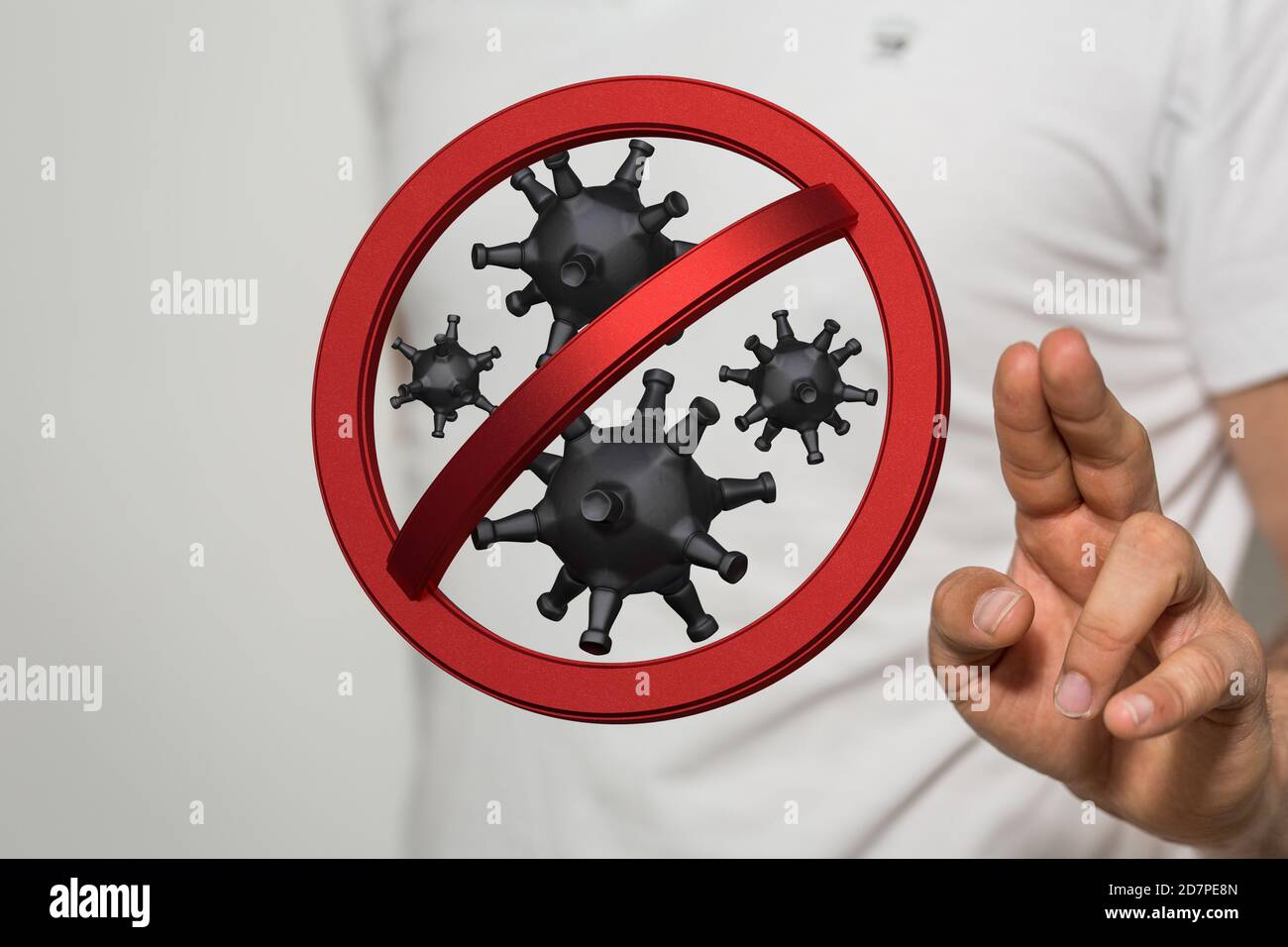 Man hand showing the 'Stop Covid-19 pandemic' sign Stock Photo - Alamy