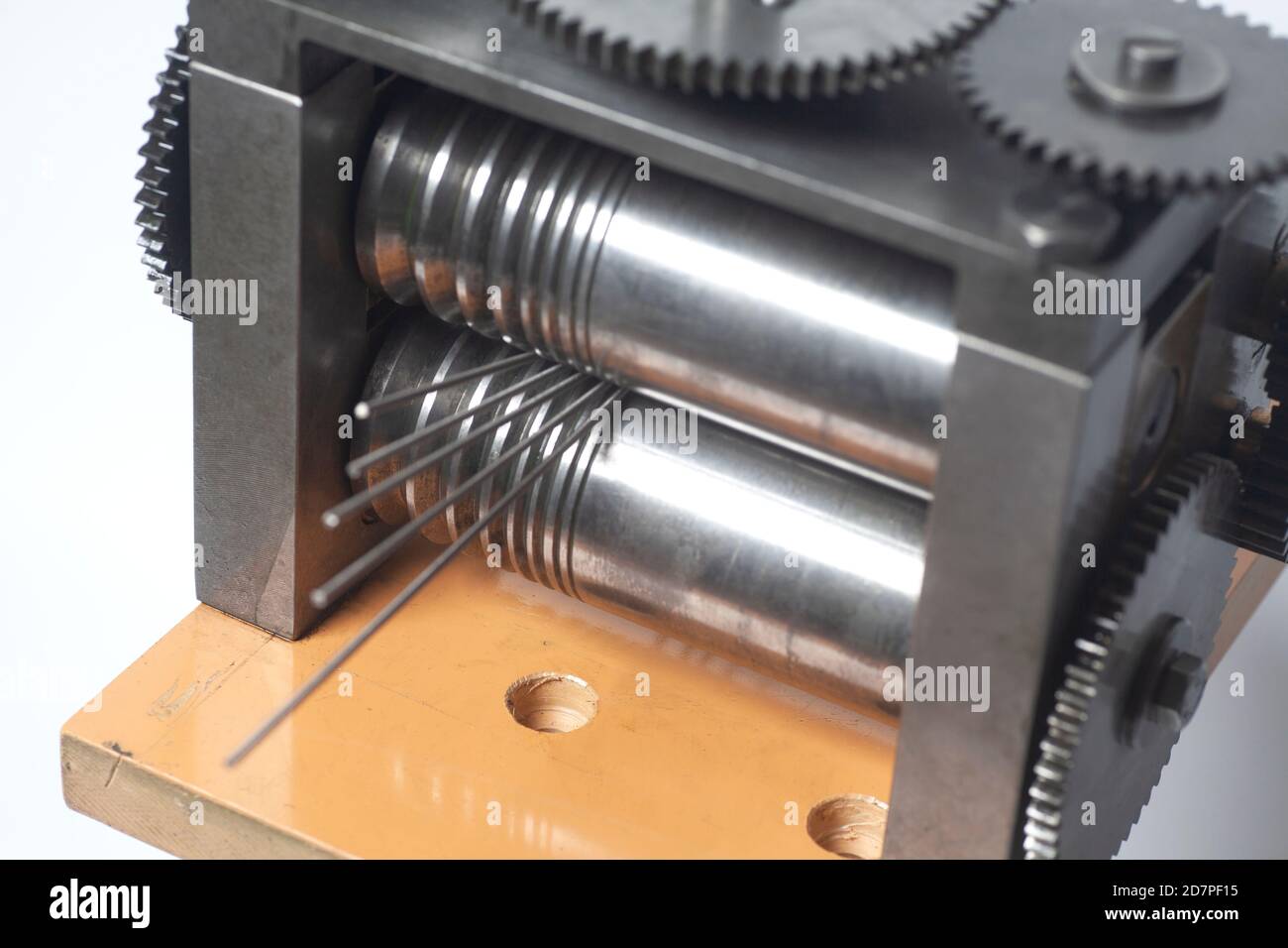 Jewelry rolling mill tool press rolling of a silver wire Stock Photo ...