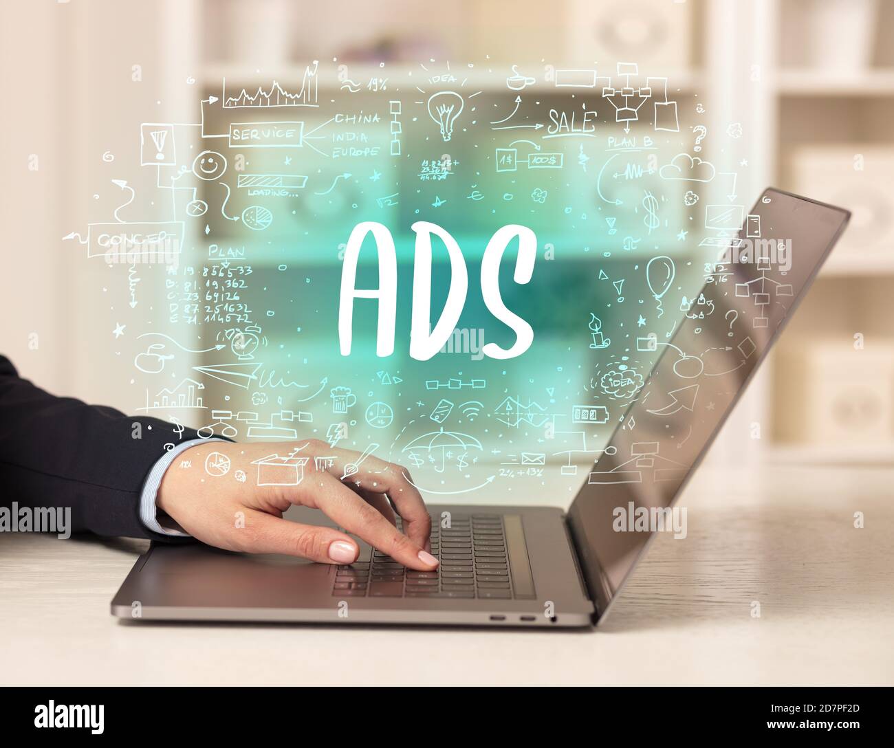 hand working on new modern computer with ADS abbreviation, modern ...