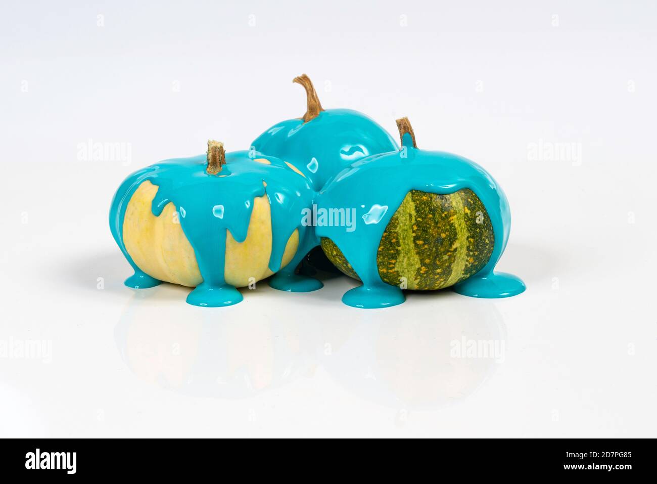 Some pumpkins with the blue color running down Stock Photo - Alamy