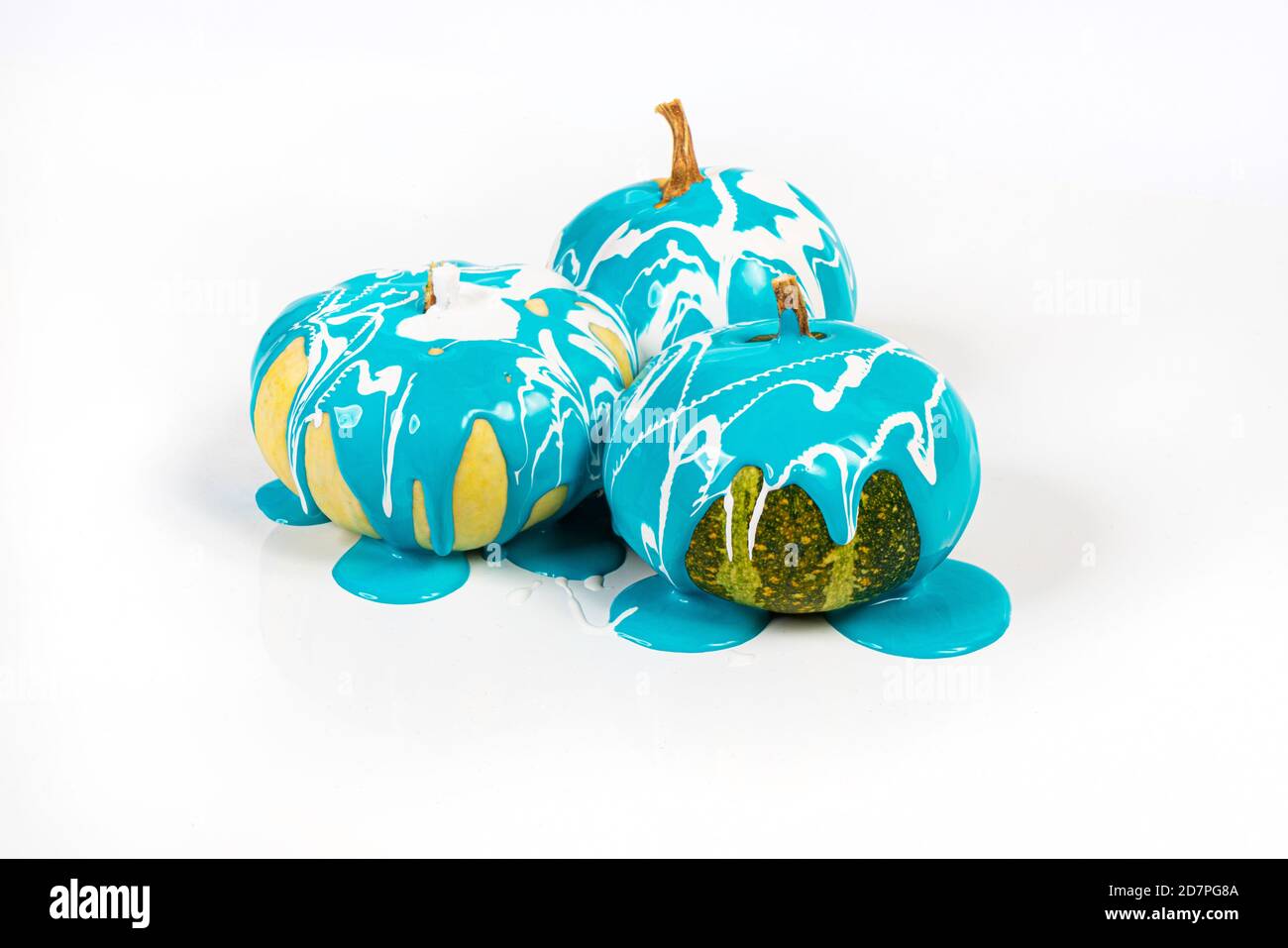 Some pumpkins with the blue color running down Stock Photo - Alamy