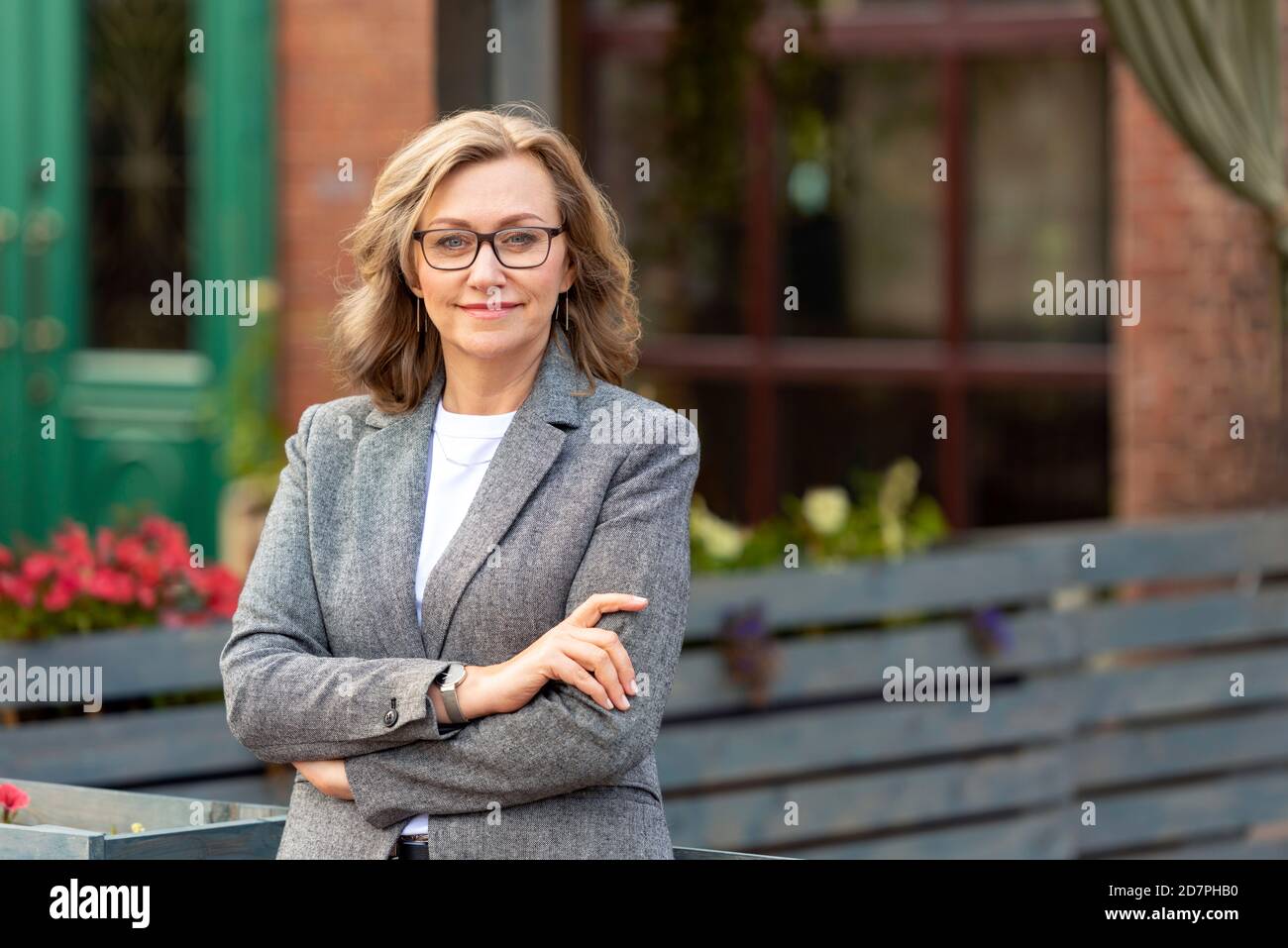 Portrait Of A Pretty Mature Business Woman 55 Years Old Outdoors In