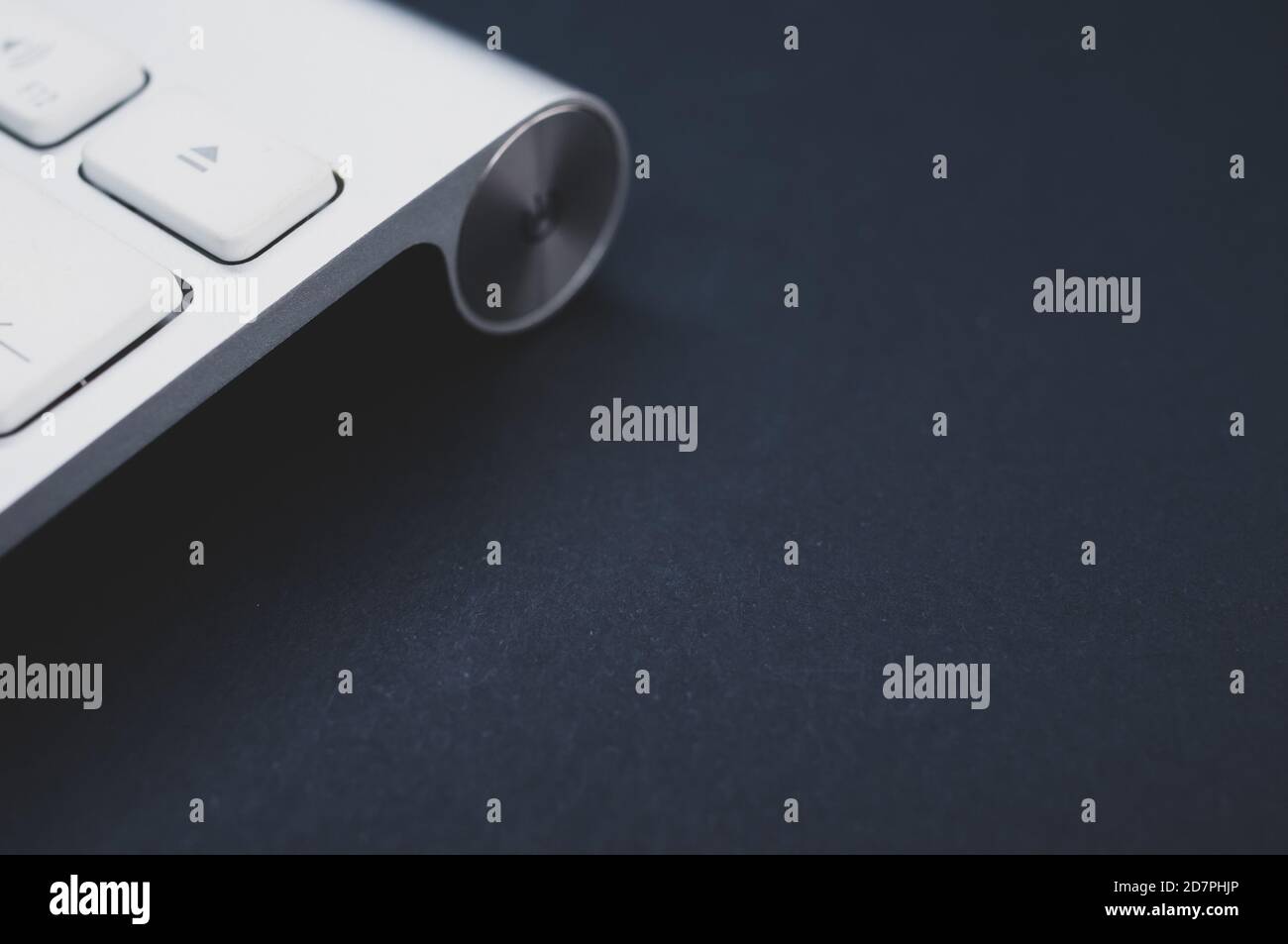 Closeup of a modern and clean keyboard on a dark surface Stock Photo ...