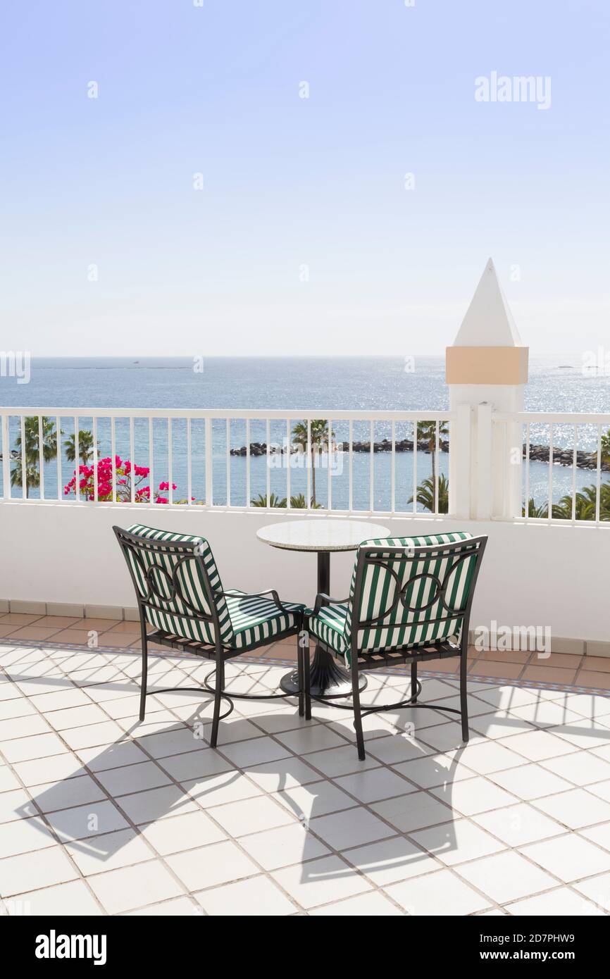 Two chairs on balcony hi-res stock photography and images - Alamy