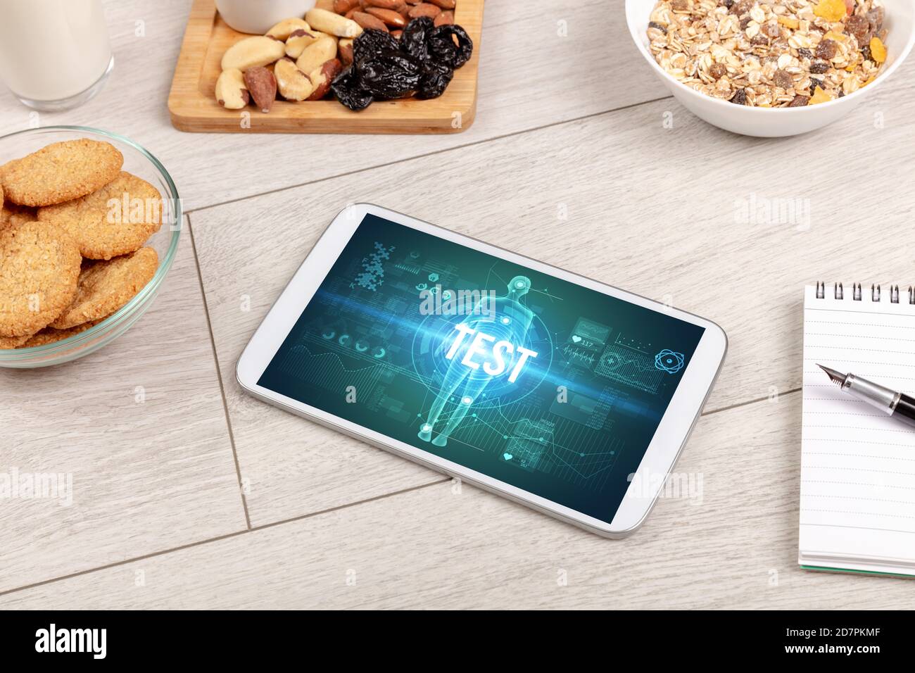 TEST concept in tablet with fruits, top view Stock Photo - Alamy