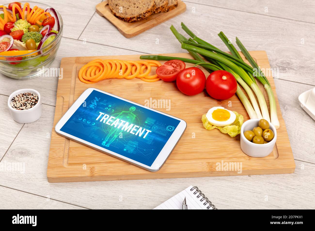 TREATMENT concept in tablet with fruits, top view Stock Photo - Alamy