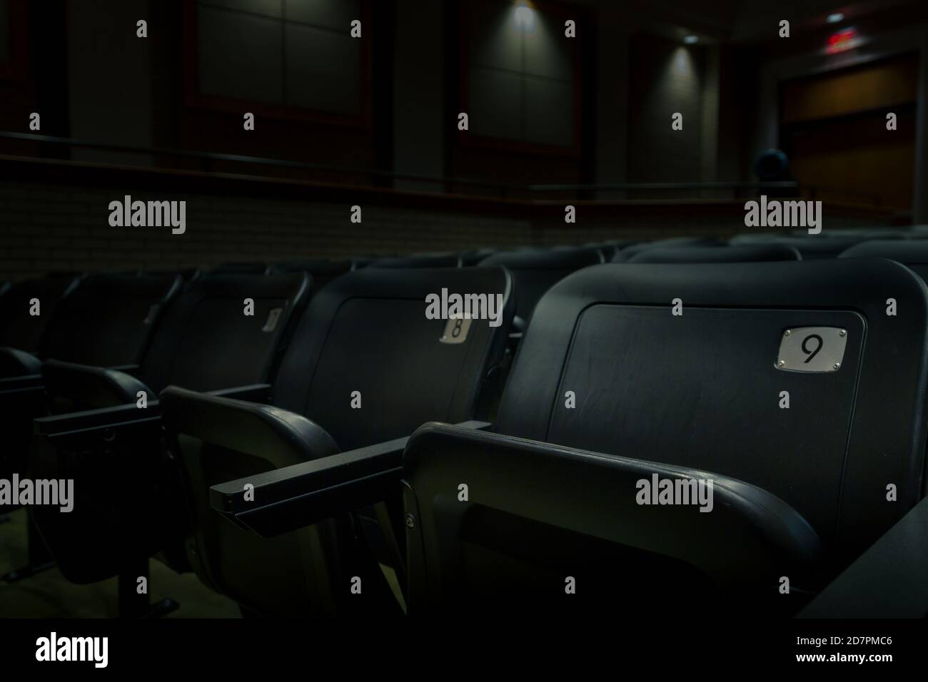 Numbered Theatre Seats in a Dark Empty Theatre Stock Photo - Alamy