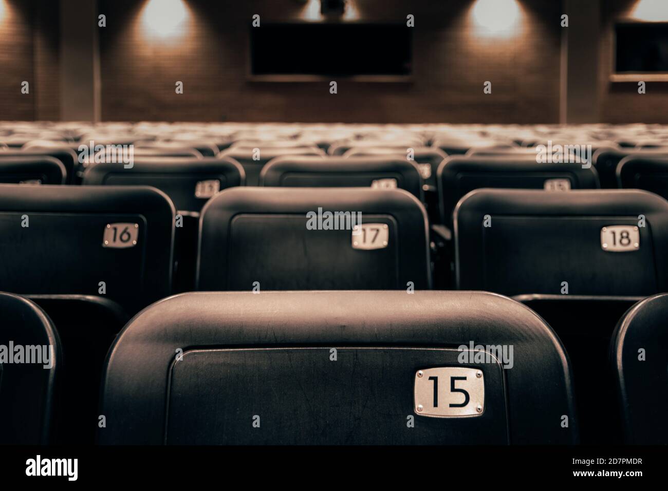 Numbered Theatre Seats in a Dark Empty Theatre Stock Photo - Alamy