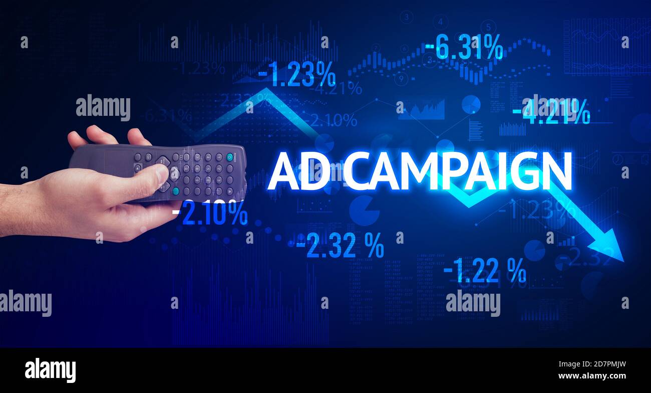 male hand holding wireless peripheral with AD CAMPAIGN inscription ...