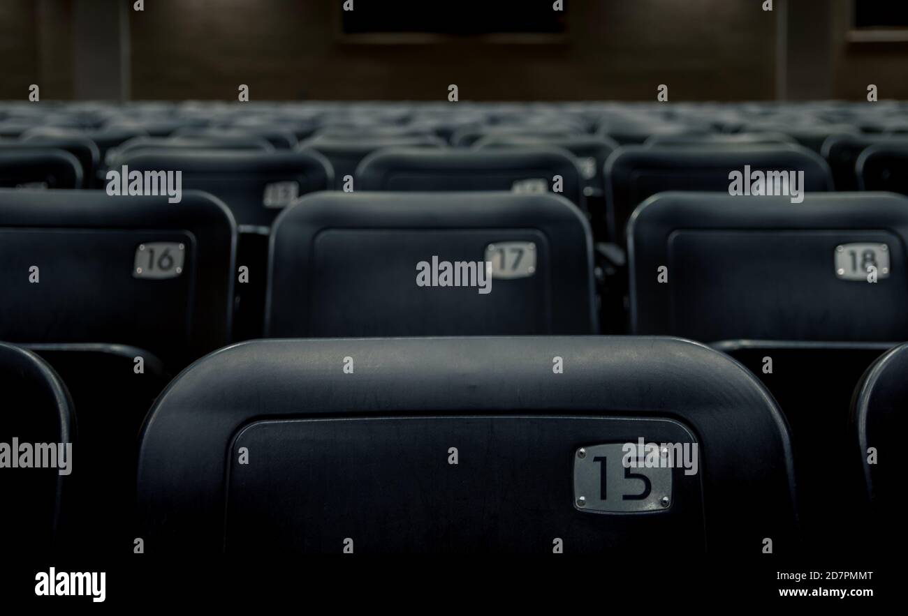 Numbered Theatre Seats in a Dark Empty Theatre Stock Photo - Alamy