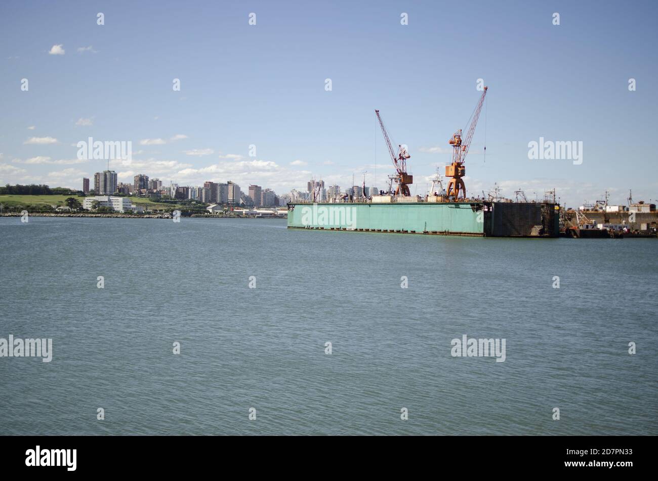 Cranes in dry dock in the seaport Stock Photo - Alamy