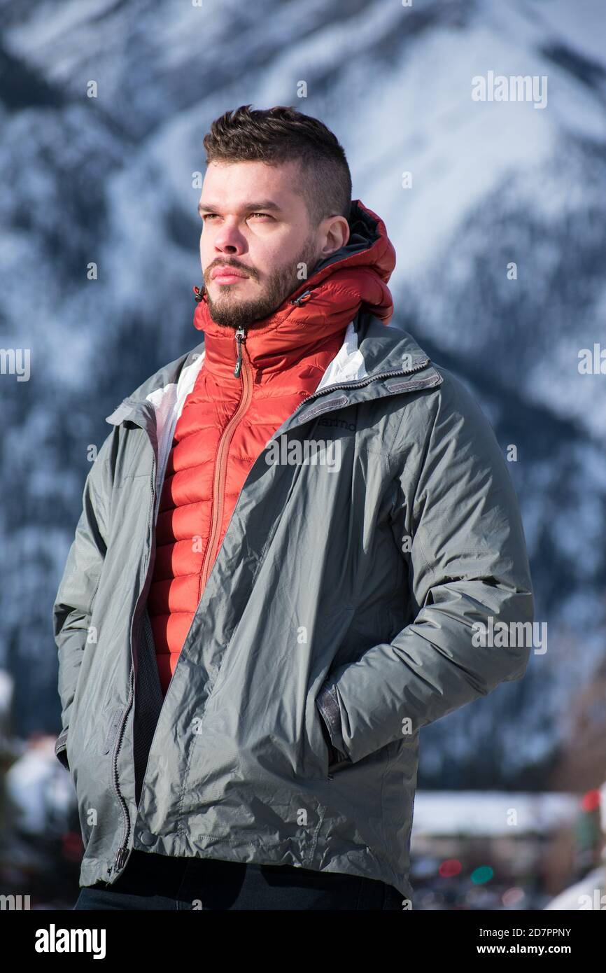 Person in winter jacket hi-res stock photography and images - Alamy
