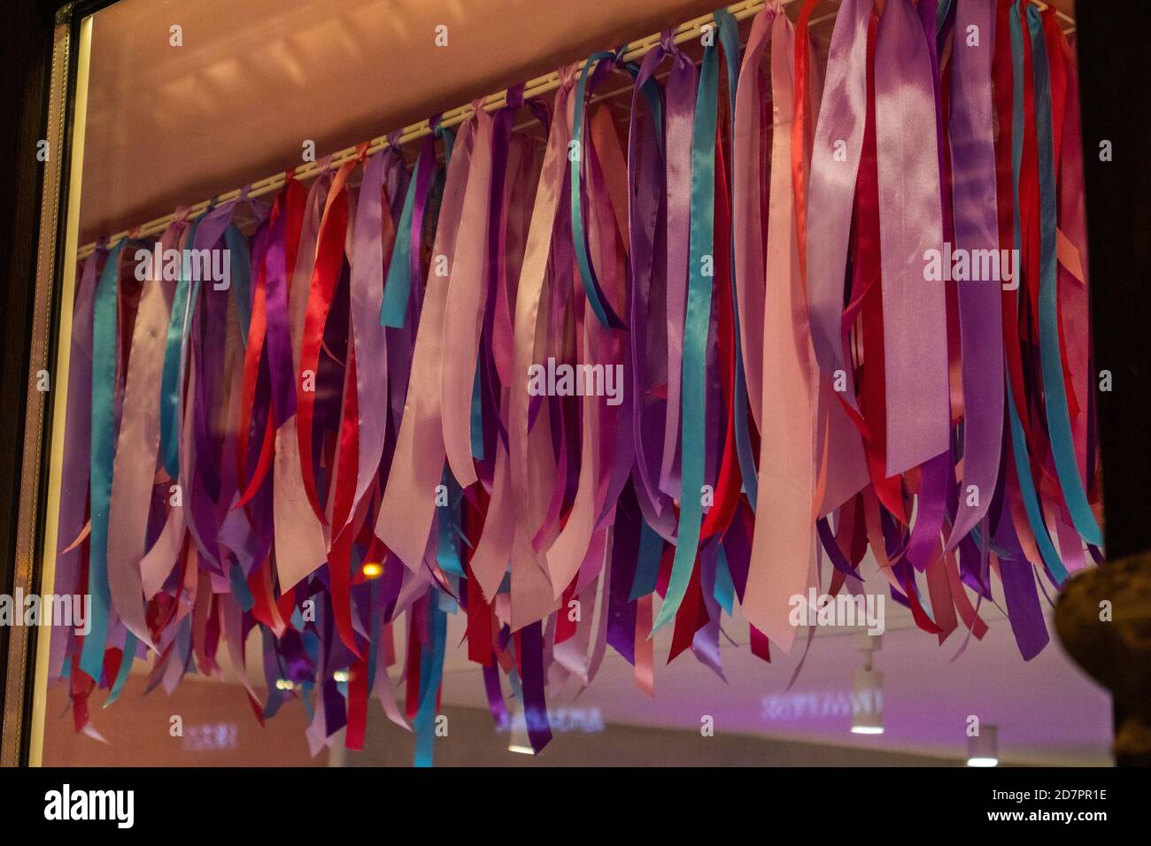 colored ribbons on the ceiling of the party birthday celebration Stock ...