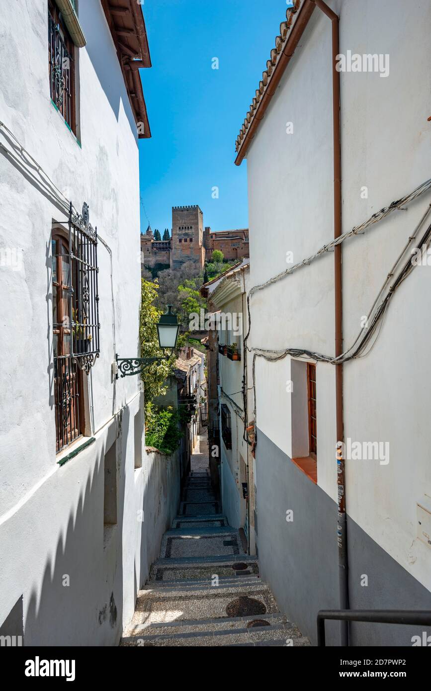 Alley with view of the towers of the alhambra hi-res stock photography ...