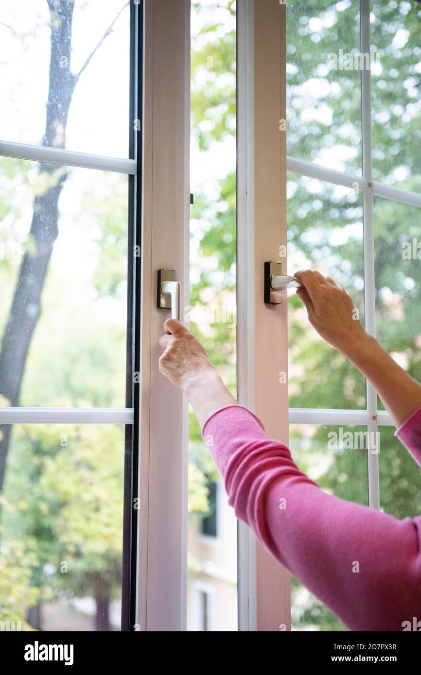 Airing in a classroom, Teacher opens window to air, Austria Stock Photo ...