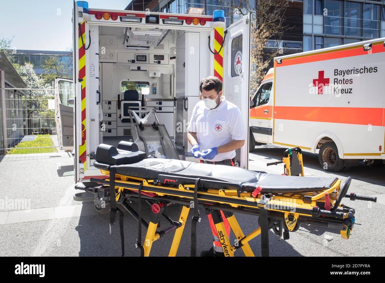 Paramedic cleans stretcher in front of Agatharied hospital, Bavaria ...