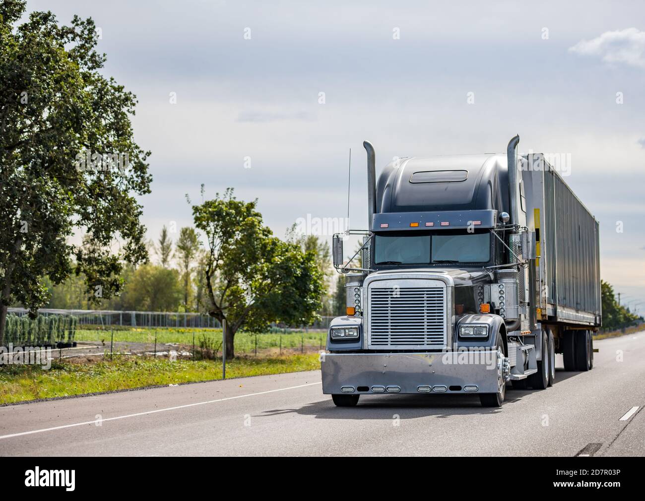 Black classic big rig diesel industrial bonnet long haul semi truck ...