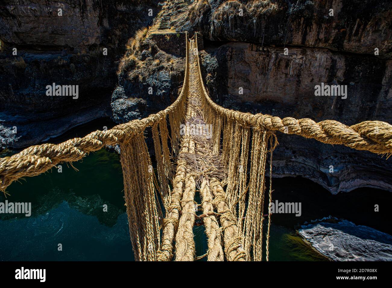 Qu'eswachaka suspension bridge, rope bridge made of woven Peruvian ...