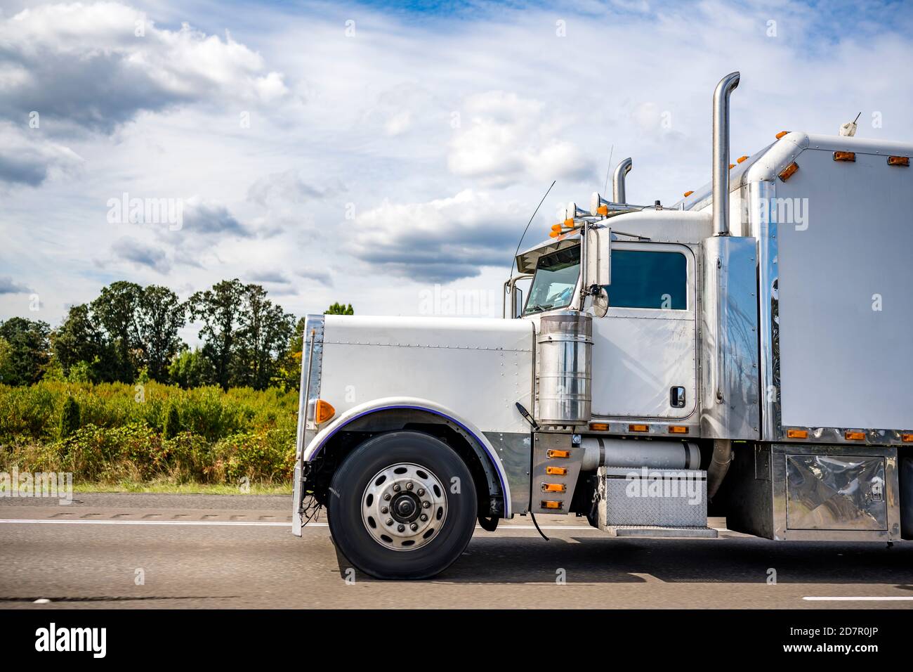 Powerful classic white big rig industrial diesel semi truck with large ...