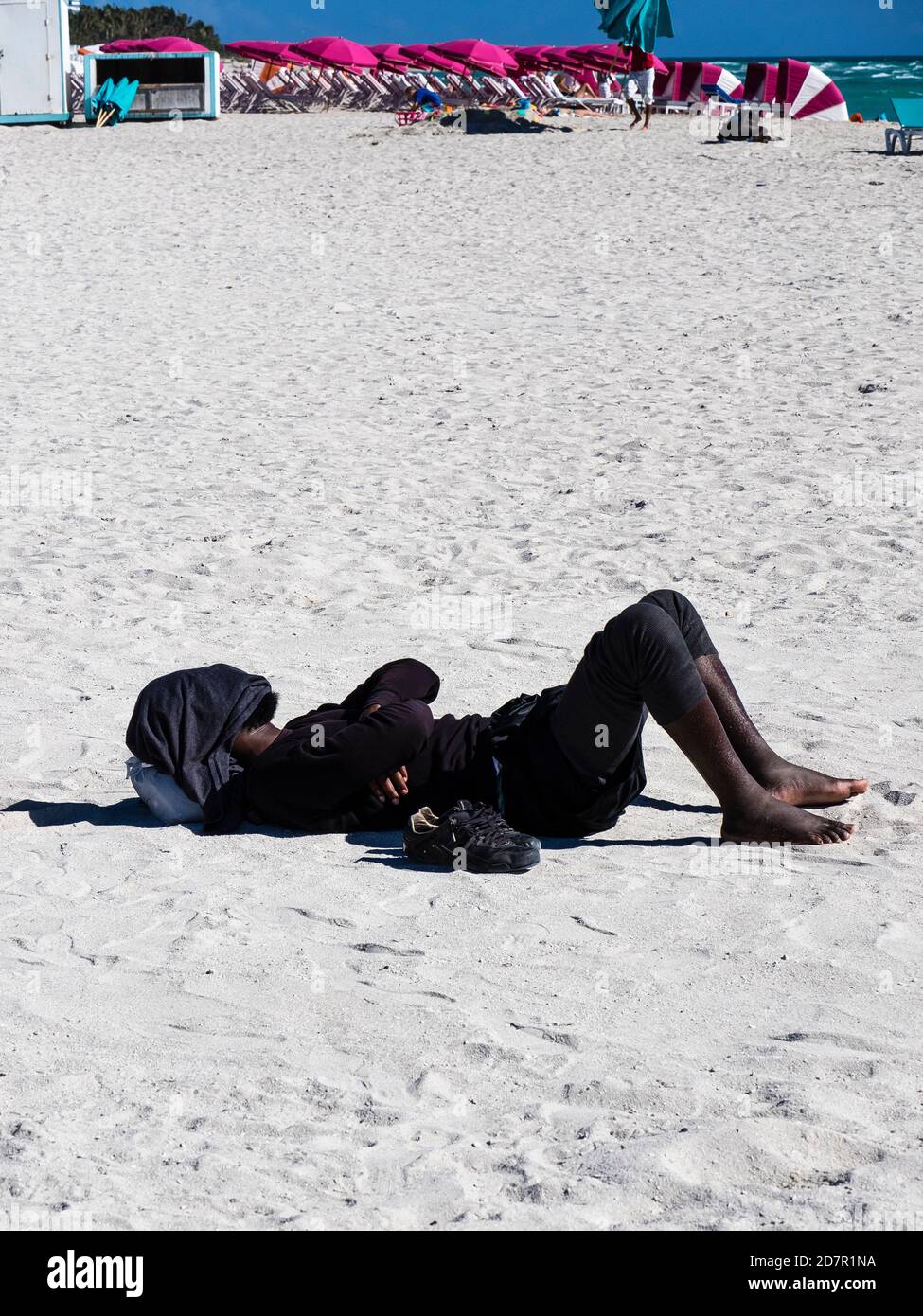 African american man sunbathing hi-res stock photography and images - Alamy