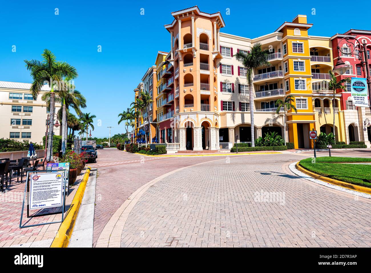 Naples, USA - April 30, 2018: Bayfront apartment building with palm ...
