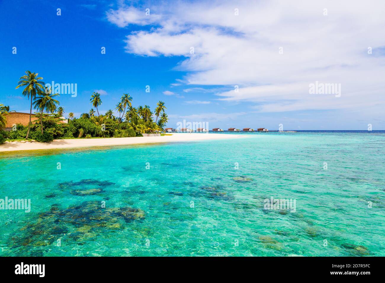 Beautiful view of the wavy ocean hitting the sandy beach under the ...