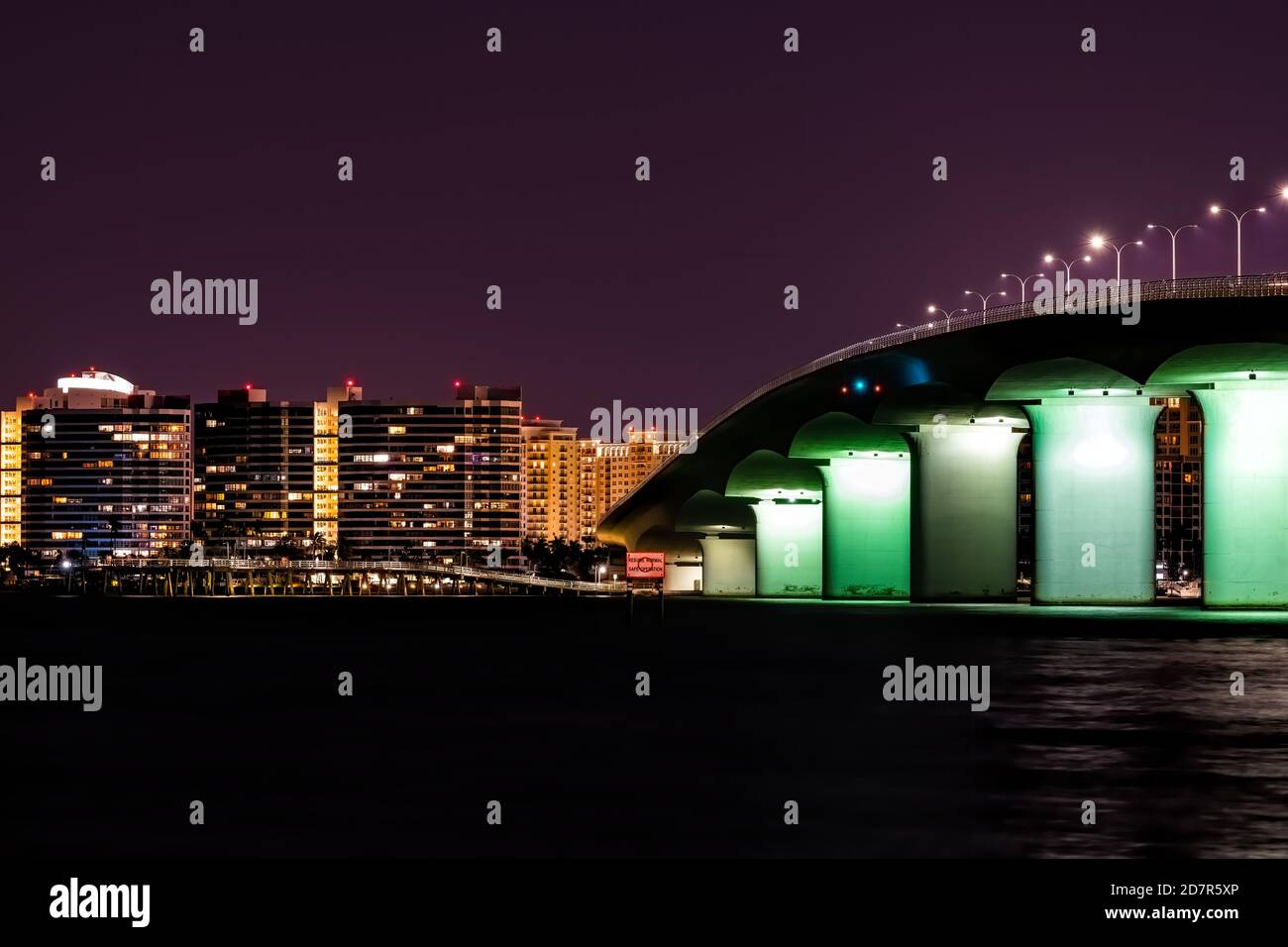John Ringling causeway bridge illuminated in Sarasota Bay Florida at ...