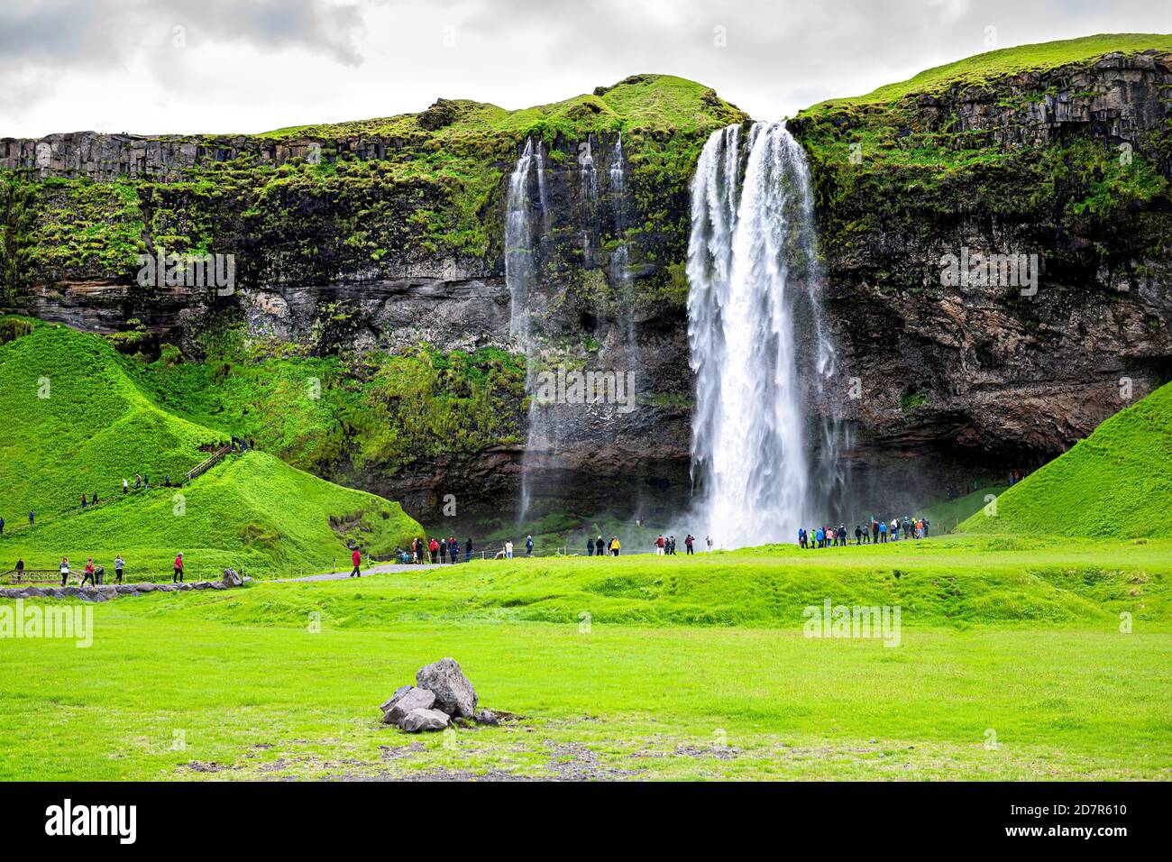 Seljalandsfoss, Iceland waterfall with white water cliff in green ...