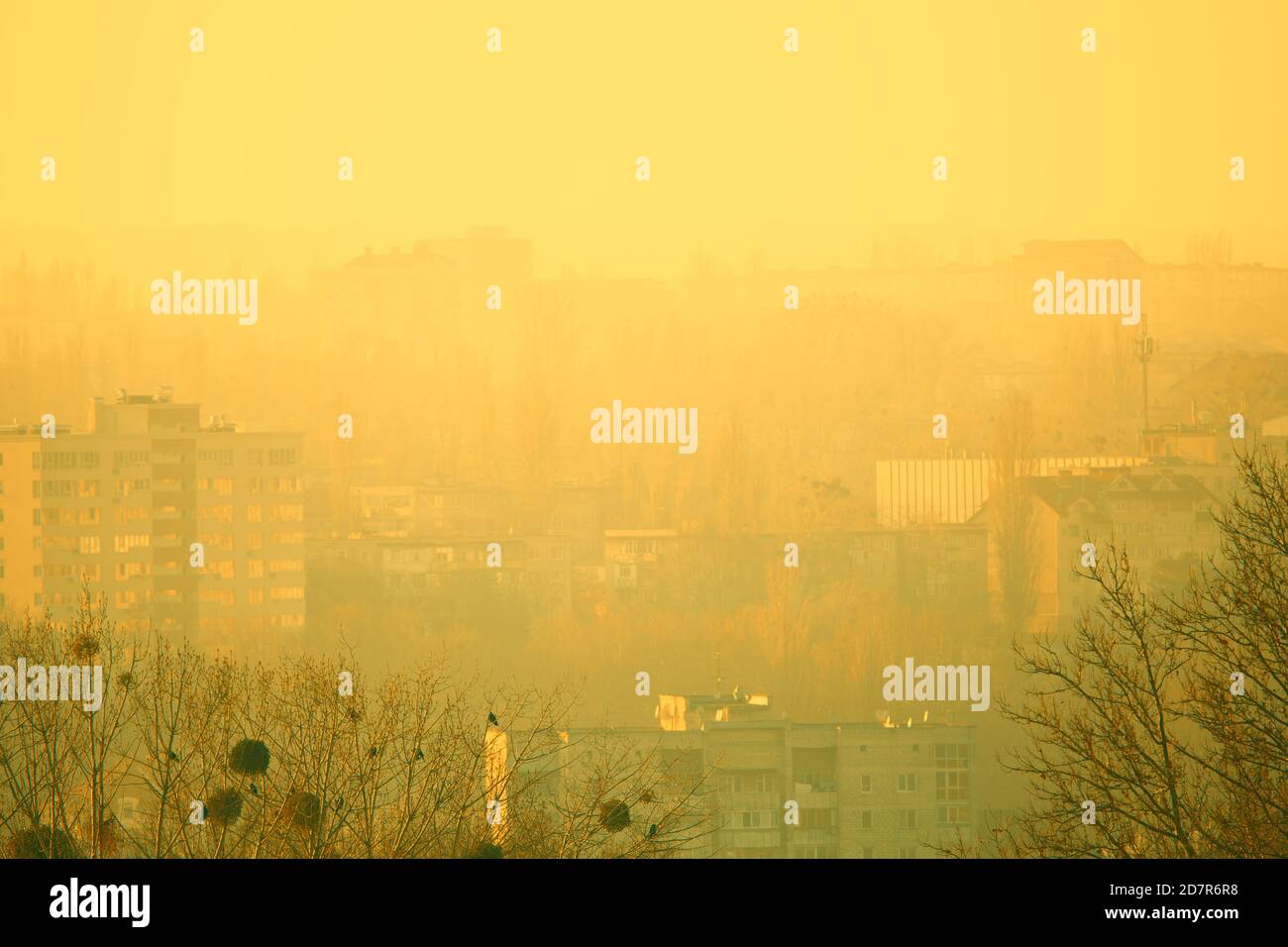Yellow fog in the city . Morning cityscape in dense haze Stock Photo ...