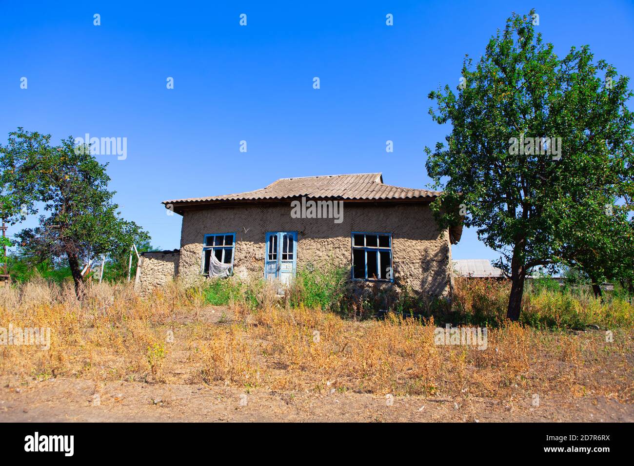Abandoned rustic house . Migration from Villages Stock Photo - Alamy