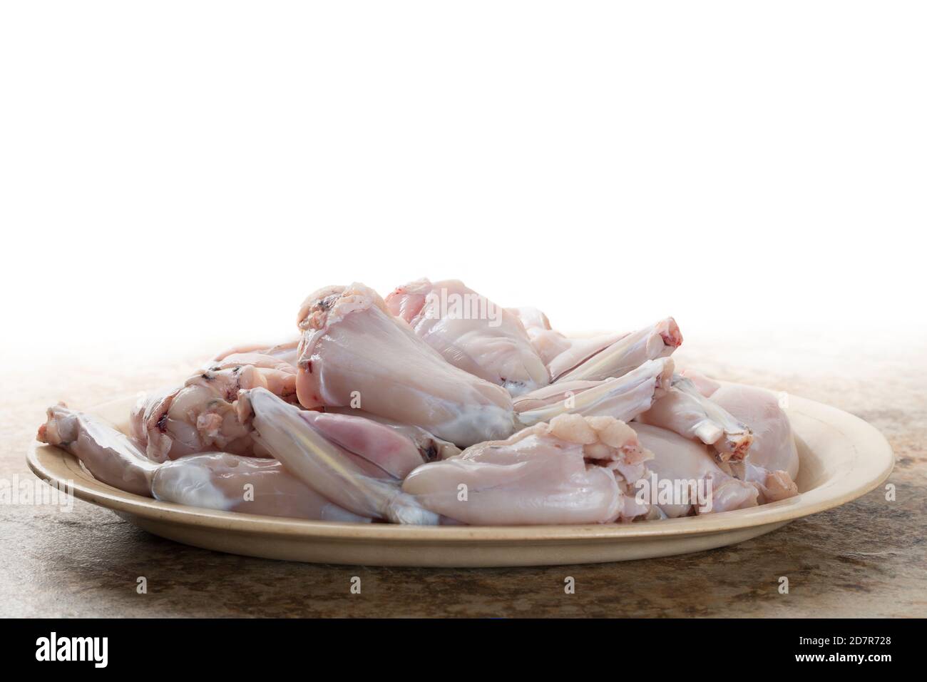 Raw frog legs hi-res stock photography and images - Alamy
