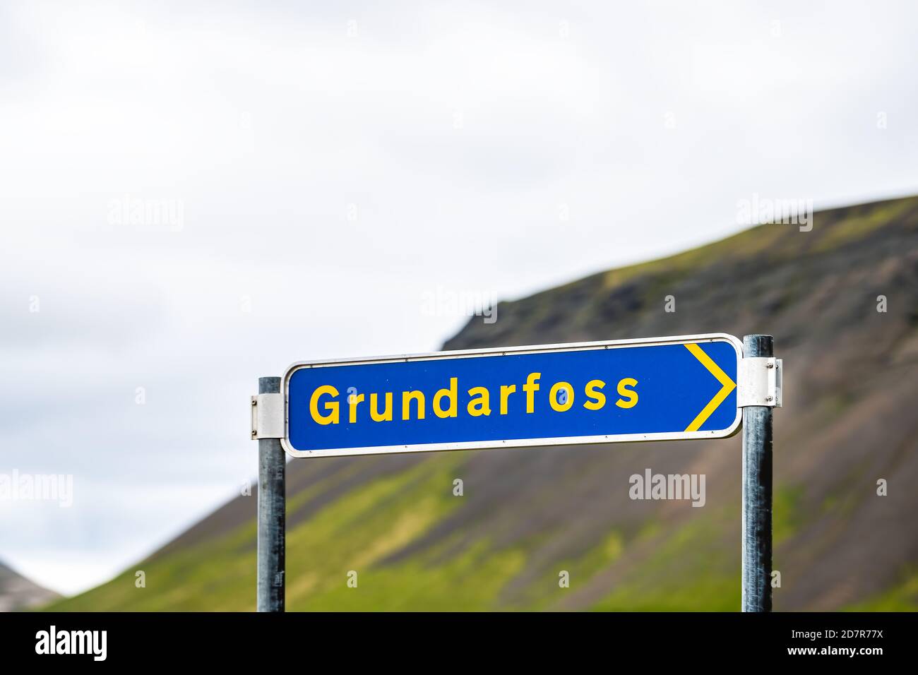 Grundarfoss Waterfall sign direction in blue in summer near ...