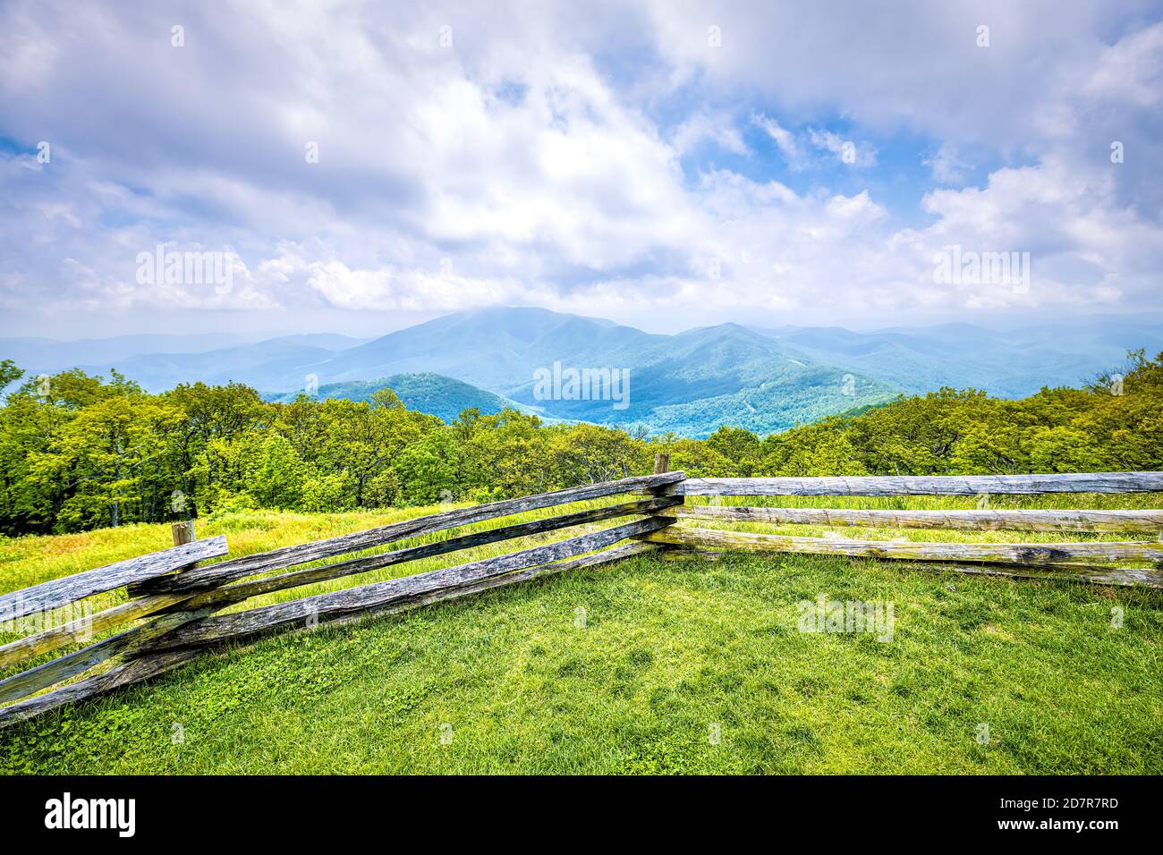 Devil's Knob Overlook with fence and green grass field meadow at ...