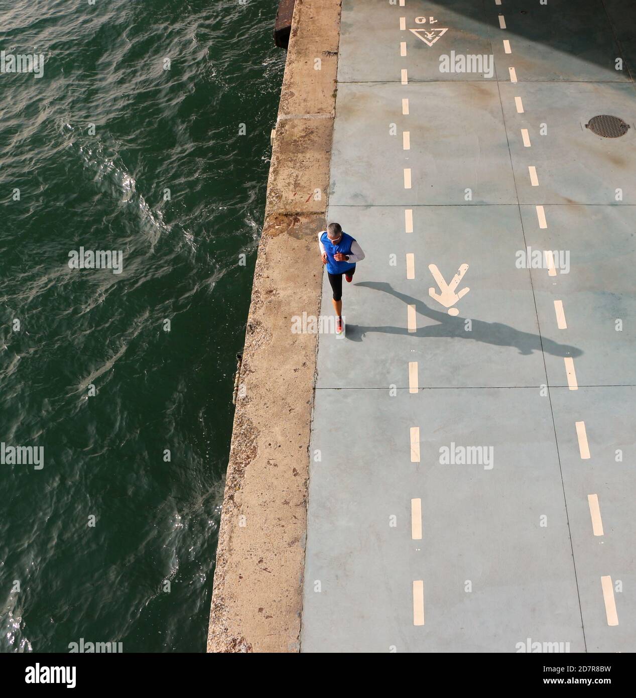 Man running looking from above hi-res stock photography and images - Alamy