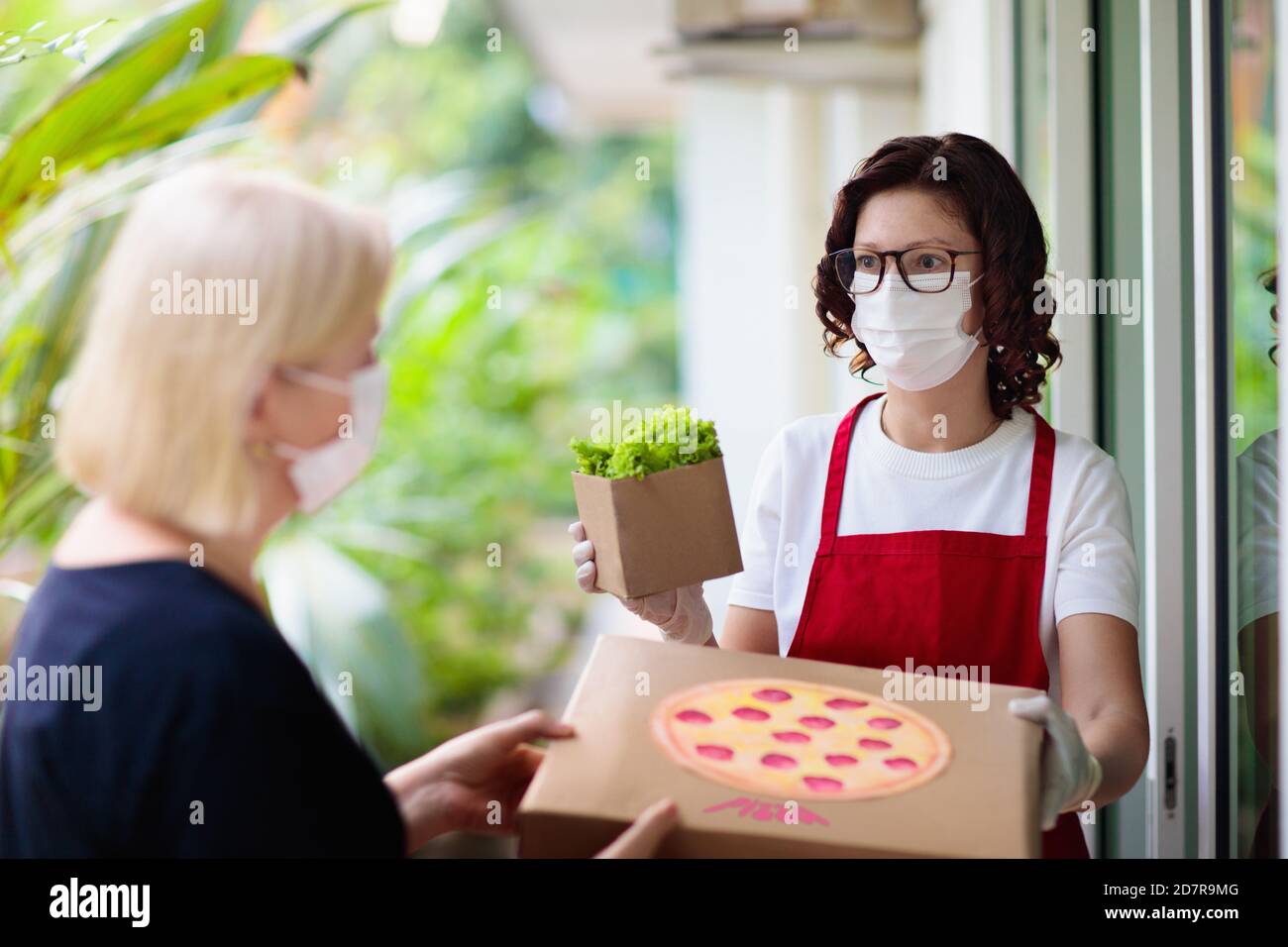 Food delivery in lockdown. Take away food during coronavirus outbreak ...