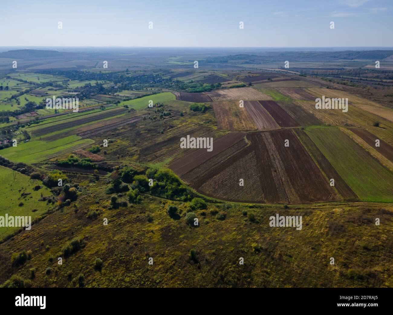 Aerial view of green countryside in view of summer agricultural fields ...