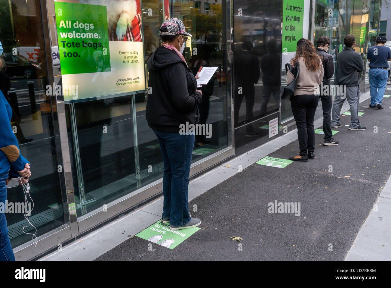 New York, United States. 24th Oct, 2020. A woman reads a book while ...