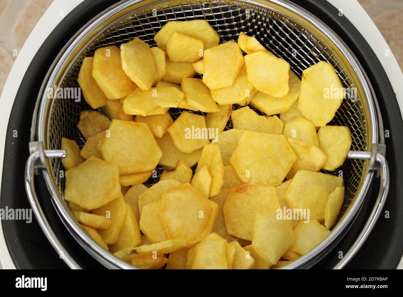fresh crispy french fries from the deep fryer Stock Photo - Alamy