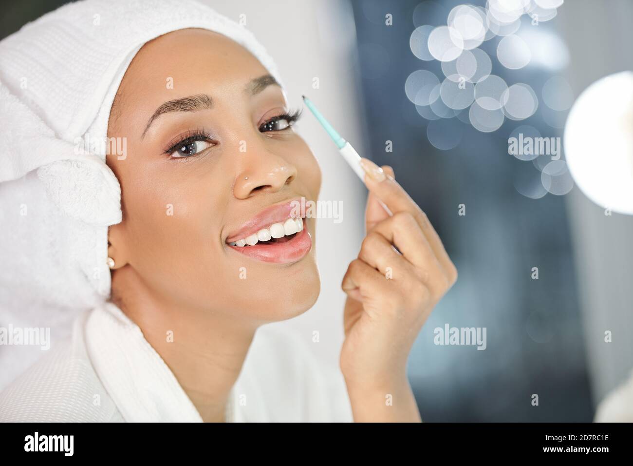 Woman Filling Eyebrows Stock Photo Alamy