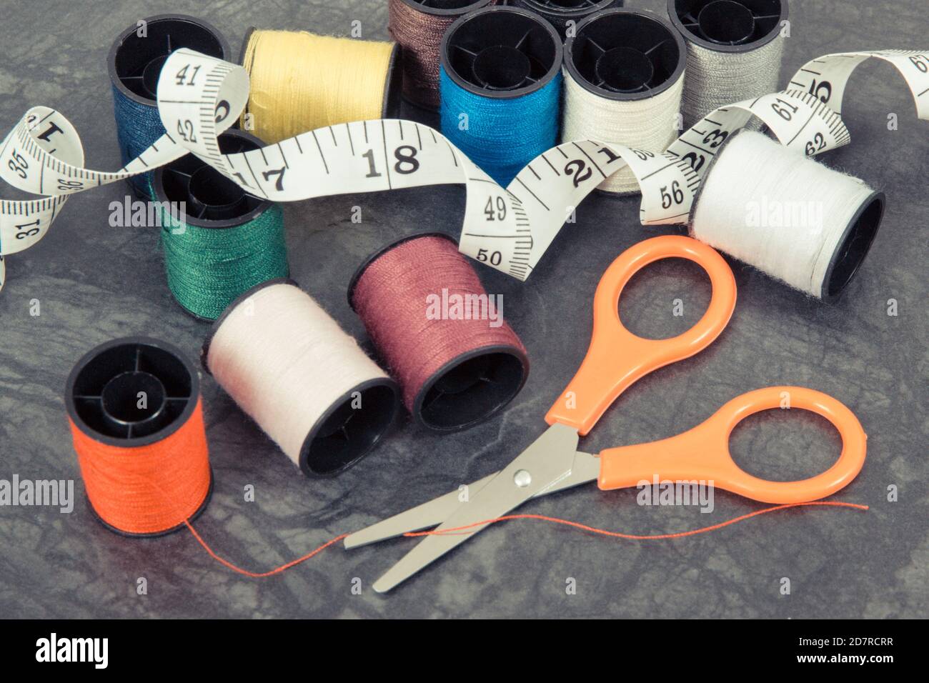 Accessories and tools for using in sewing and needlework. Spools of ...