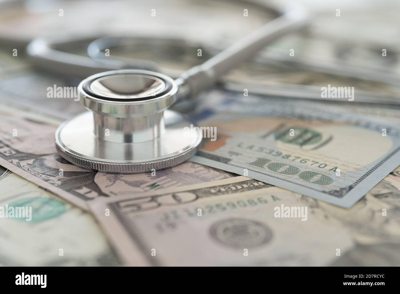 medical money, stethoscope on dollar banknote. concept of medical costs ...