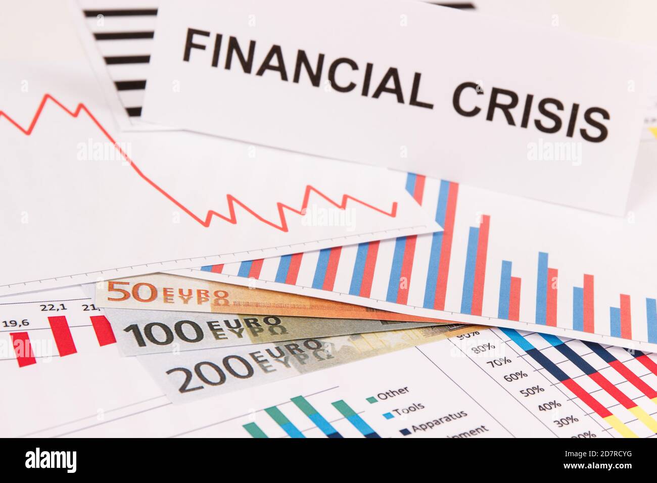 Currencies euro and downward graphs representing financial crisis ...