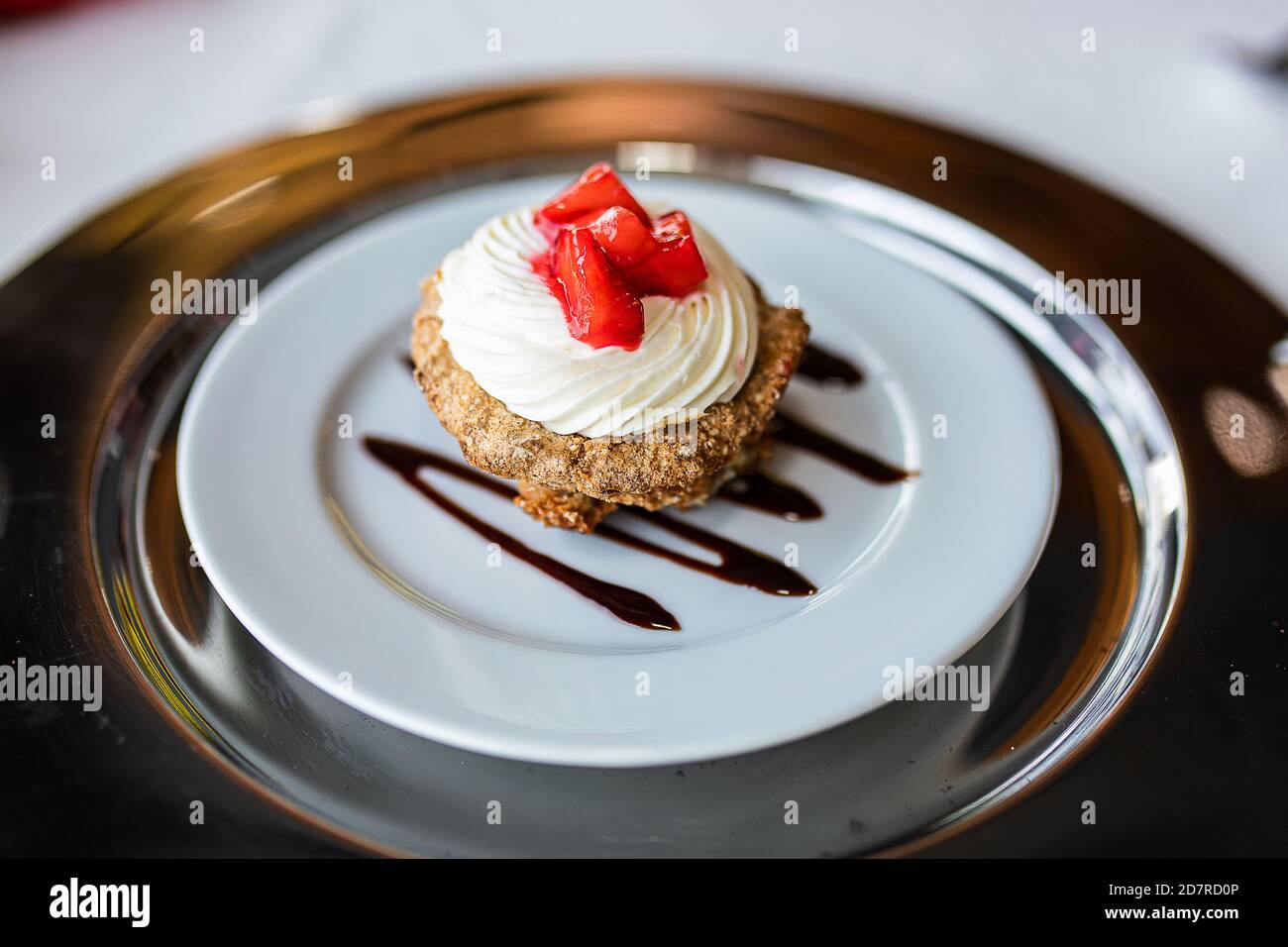 Selective focus shot of a delicious cupcake with strawberries on the ...
